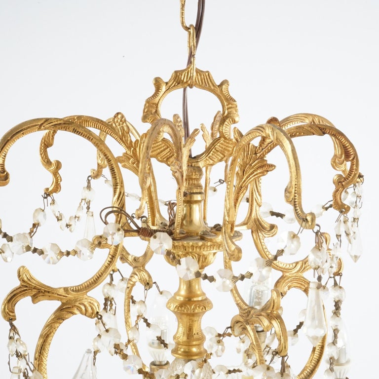French Style Gilt and Crystal Twelve-Light Tiered Chandelier, Circa ...