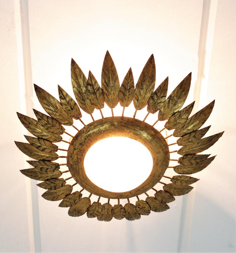 French Sunburst Flower Light Fixture in Gilt Iron and Milk Glass, 1950s ...