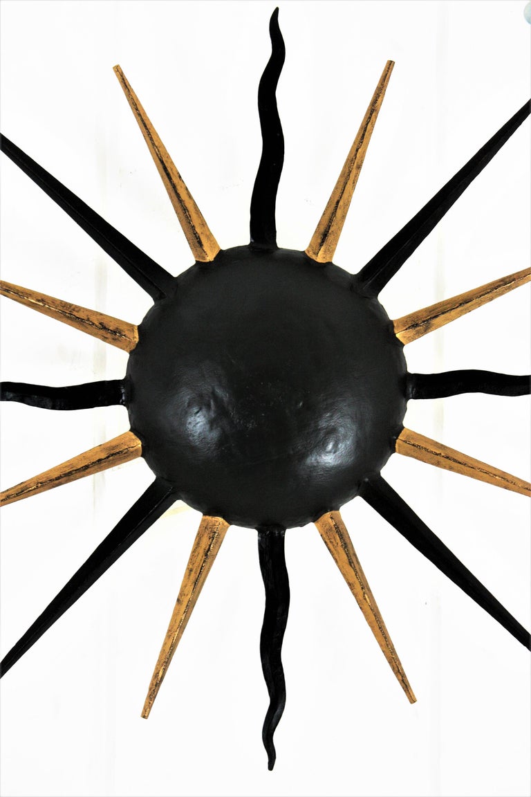 French Sunburst Light Fixture in Black and Gilt Iron, Gilbert Poillerat ...