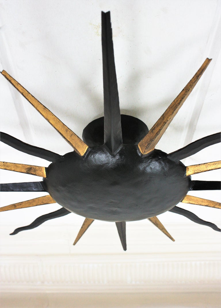 French Sunburst Light Fixture in Black and Gilt Iron, Gilbert Poillerat ...