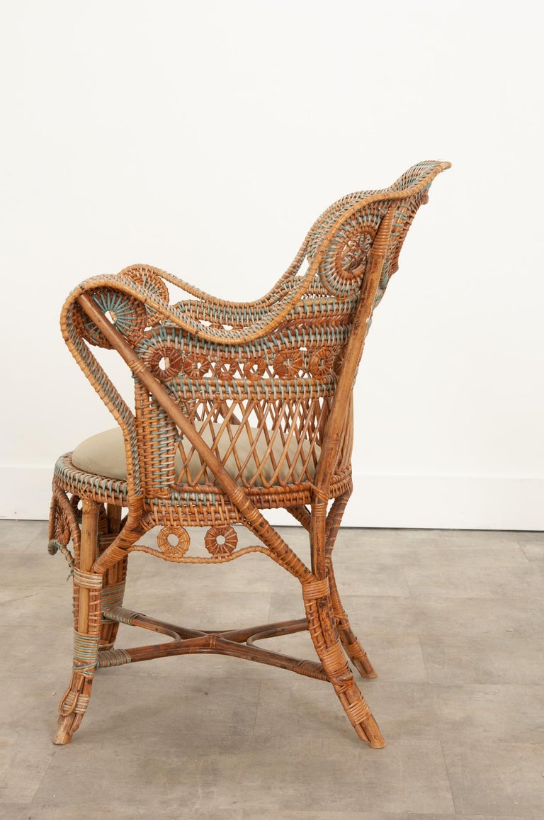 French Vintage Rattan Arm Chair at 1stDibs
