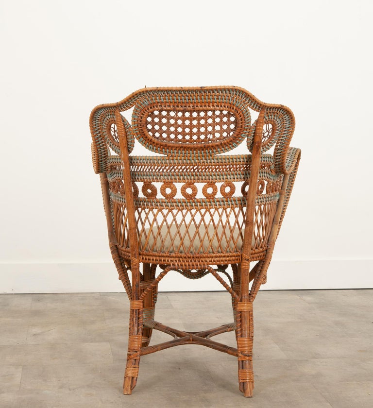 French Vintage Rattan Arm Chair at 1stDibs