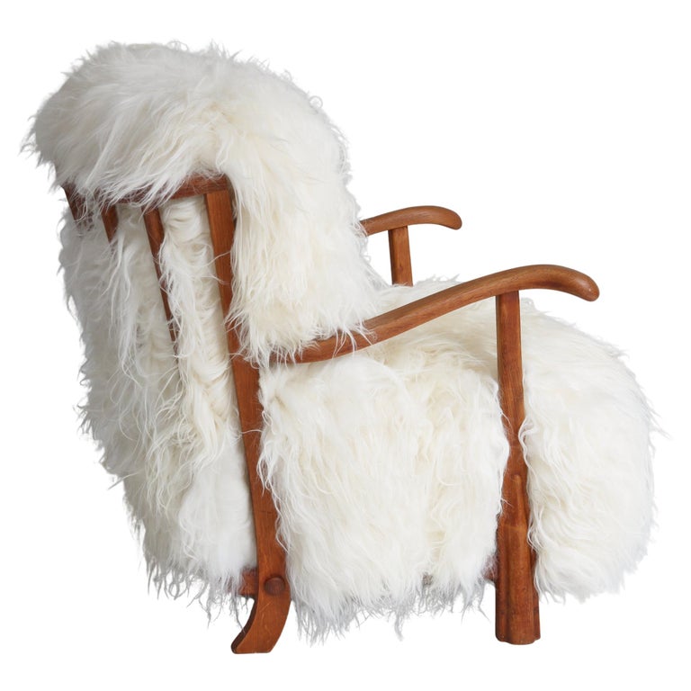 Fritz Hansen Lounge Chair Model 1594 in Oak and Sheepskin, 1940s at 1stDibs