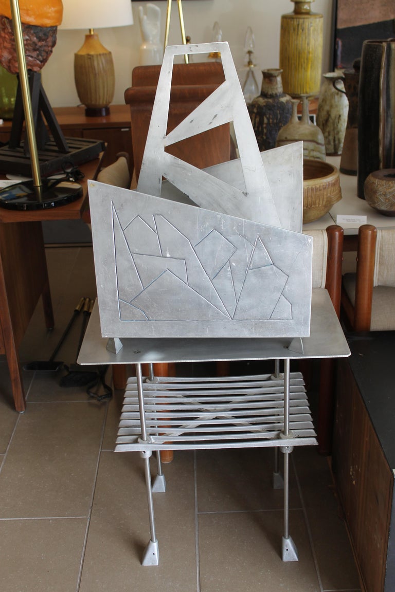 Futuristic Aluminum Magazine / Log Holder Rack For Sale at 1stDibs