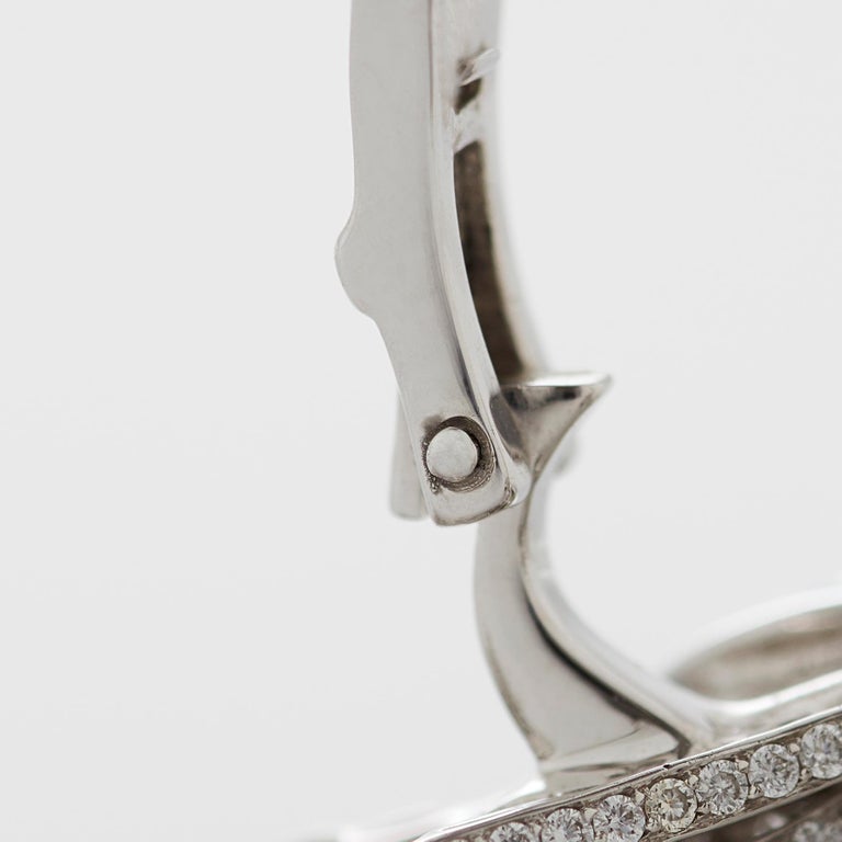 Garrard 'Bow' 18 Karat White Gold Round and Emerald Cut White Diamond ...