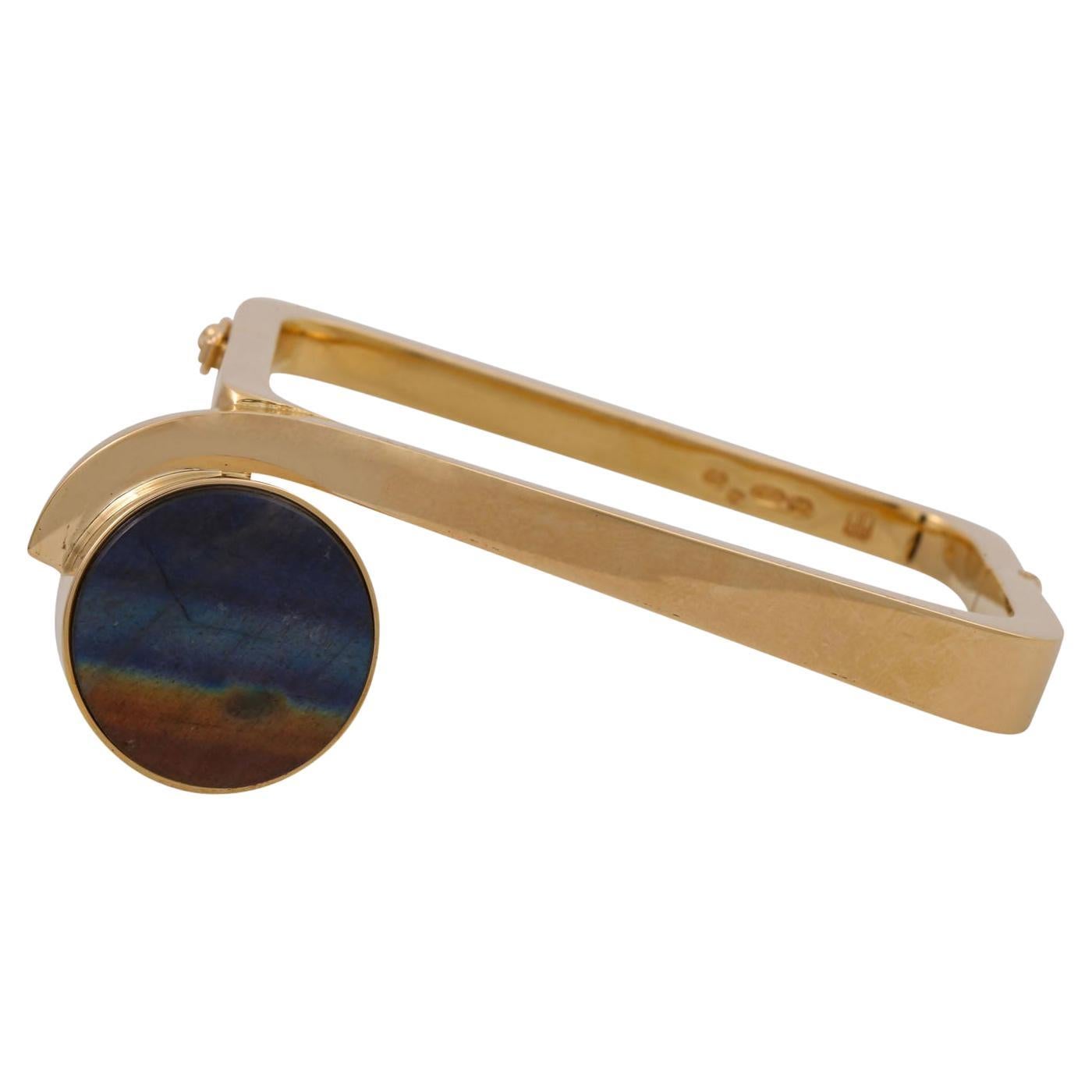 Geometric bangle with hawk eye For Sale at 1stDibs