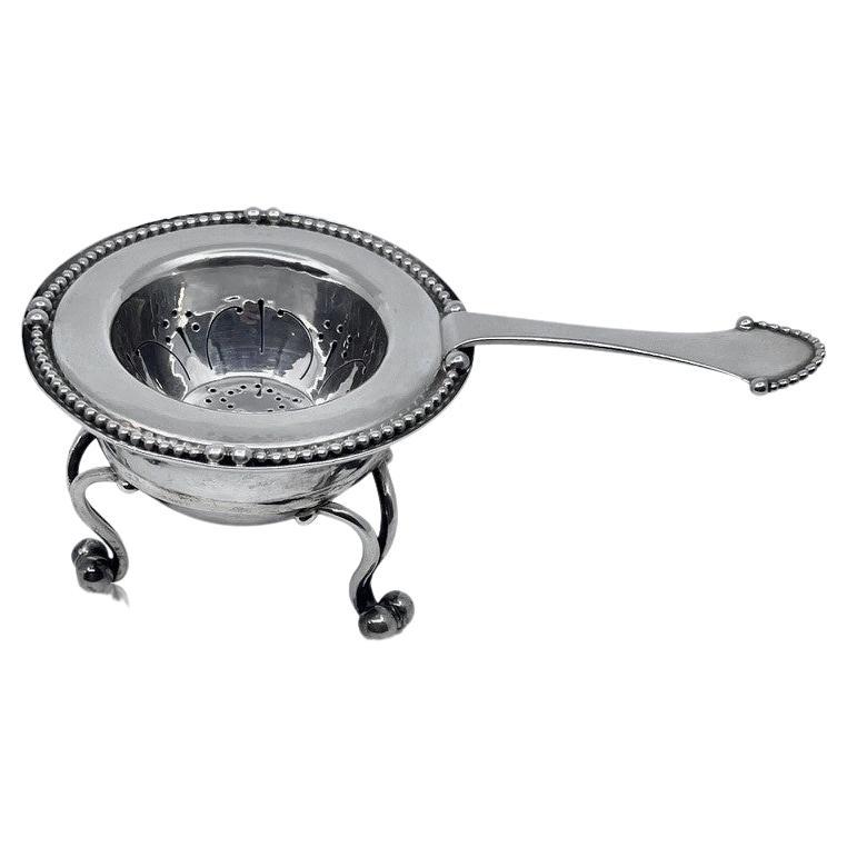 Georg Jensen Sterling Silver Tea Strainer and Base #12 For Sale at 1stDibs