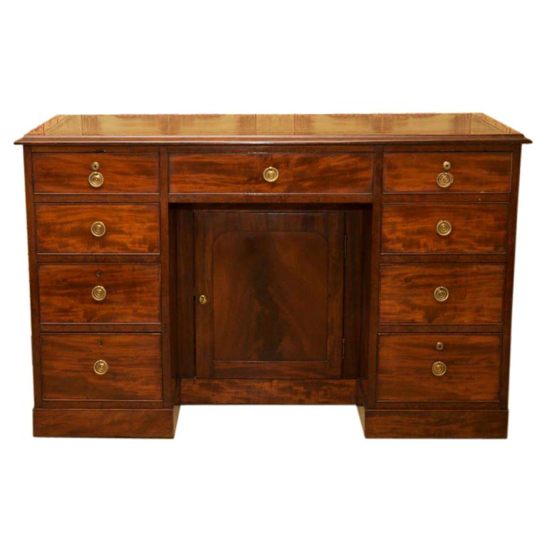 George III style Mahogany Gilt-Bronze Mounted Kneehole Desk at 1stDibs