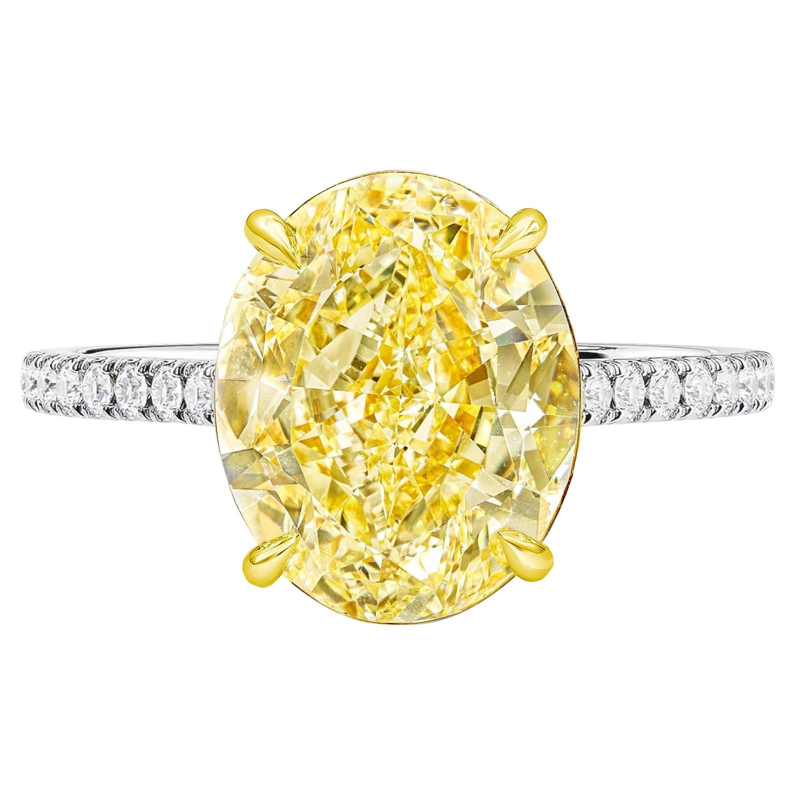 GIA Certified 10 Carat Fancy Yellow Oval Diamond Pave Ring For Sale at ...