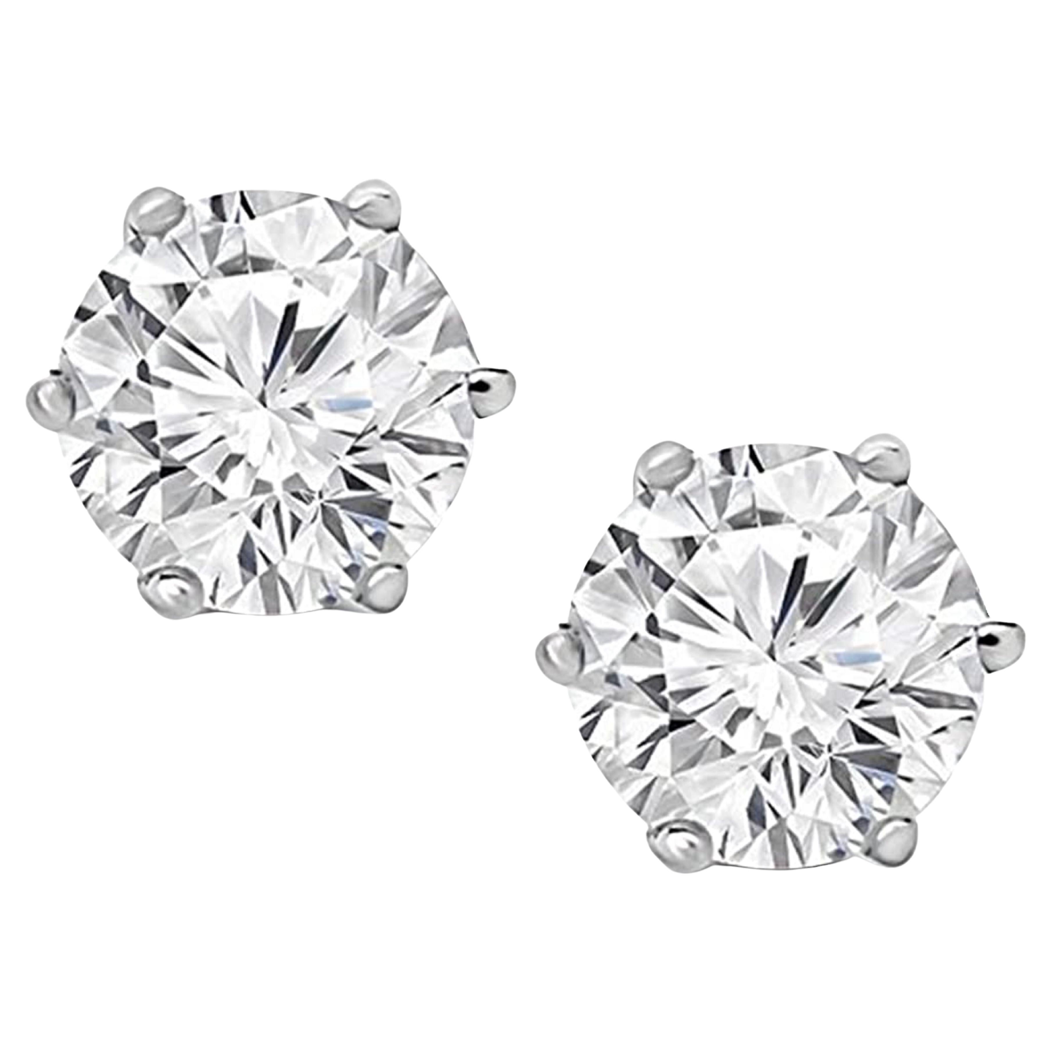 Cartier Diamond Round Cut Stud Earrings GIA 0.49 Carat Platinum at 1stDibs