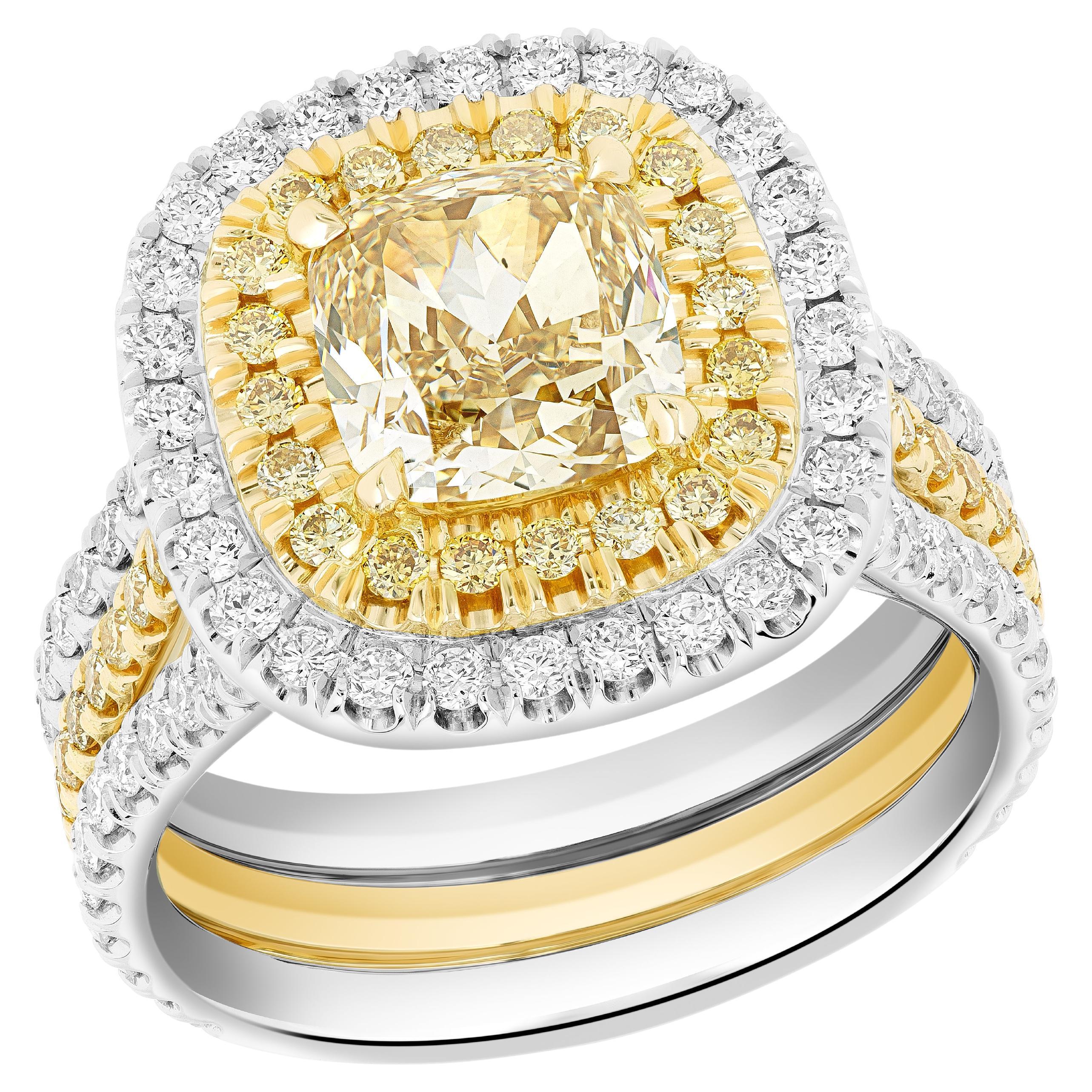IGI Certified 2.09 Carat Fancy Light Yellow Diamond in Double Diamond Halo For Sale at 1stDibs