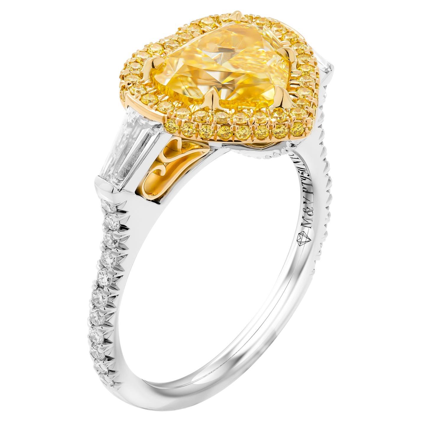 GIA Certified 0.76 Cts Fancy Yellow VS1 Modified Pear Shape Diamond 3-Stone Ring For Sale at 1stDibs