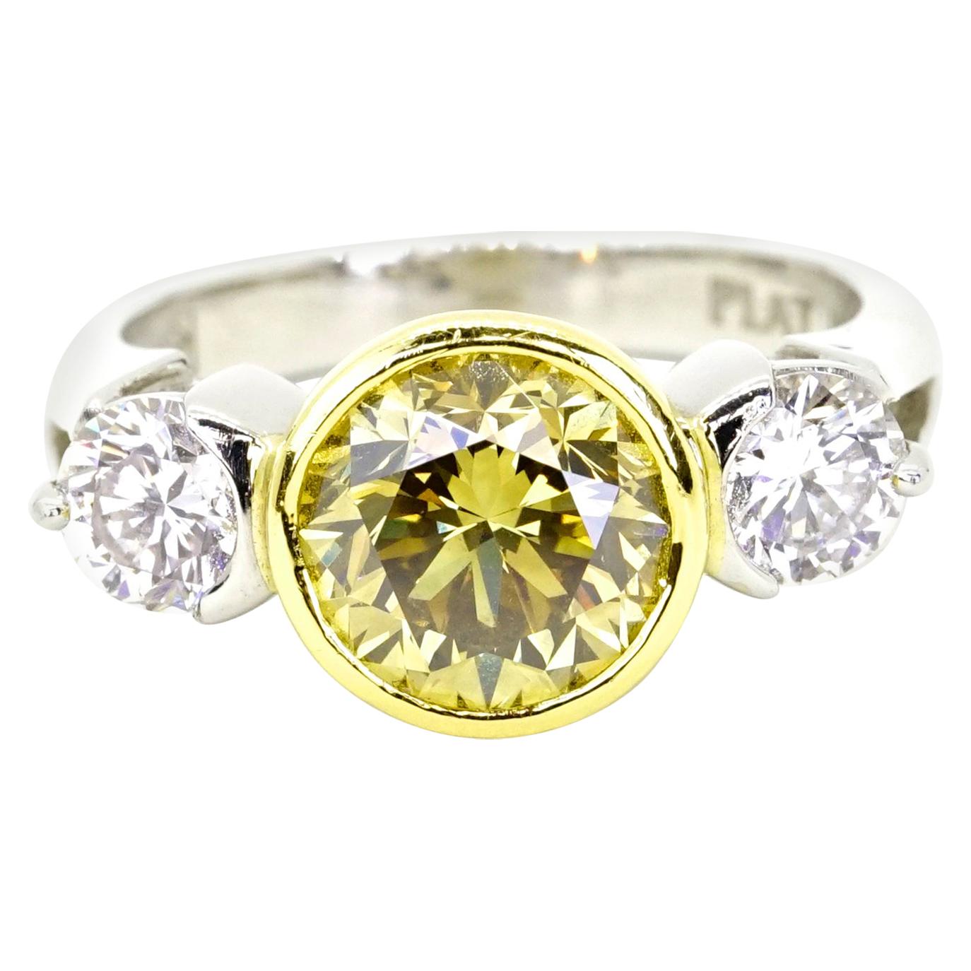 3.05 Carat GIA Certified Fancy Yellow SI2 Three-Stone Diamond Halo Ring ...