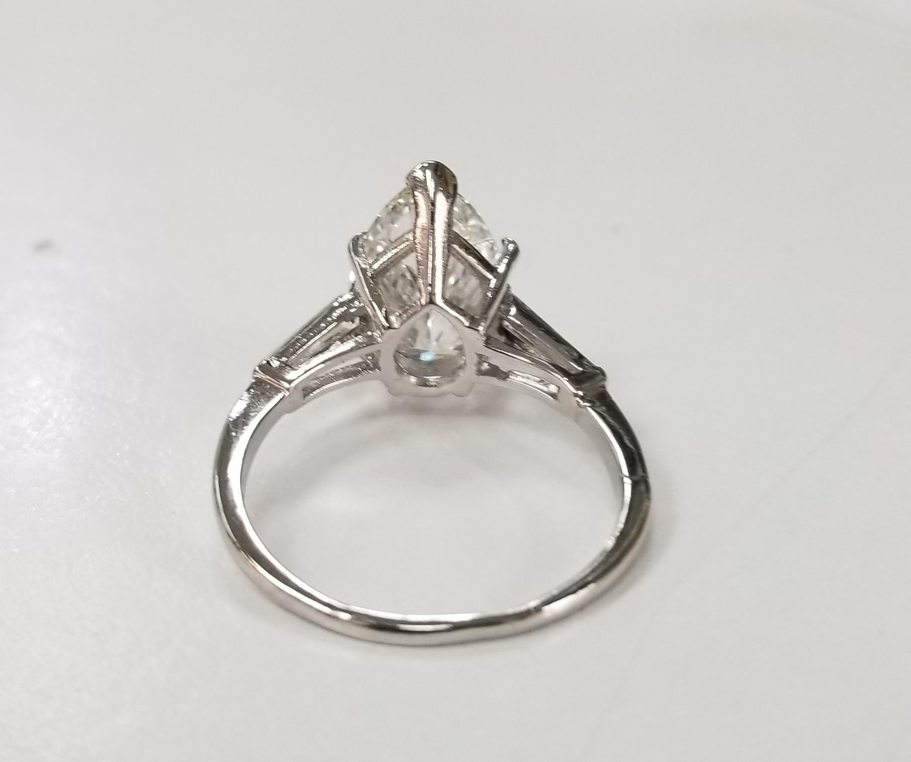 GIA Certified 3.79cts. Pear Shape Diamond Set in Platinum w/ 2 Tapper ...