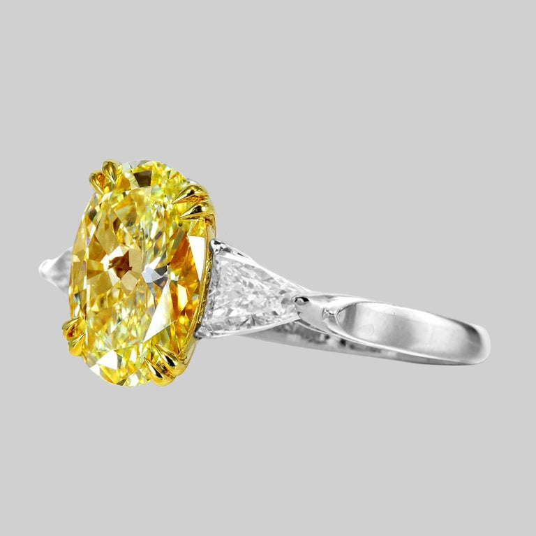 GIA Certified 5 Carat Fancy Yellow Oval Diamond Solitaire Ring For Sale ...