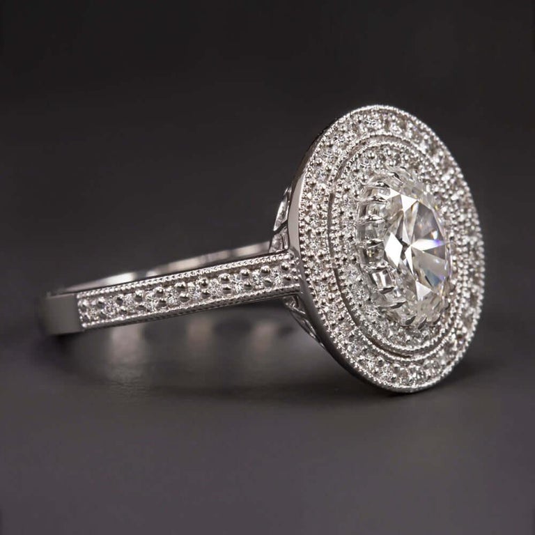 GIA Certified Diamond Surrounded by a Glittering Double Diamond Halo ...