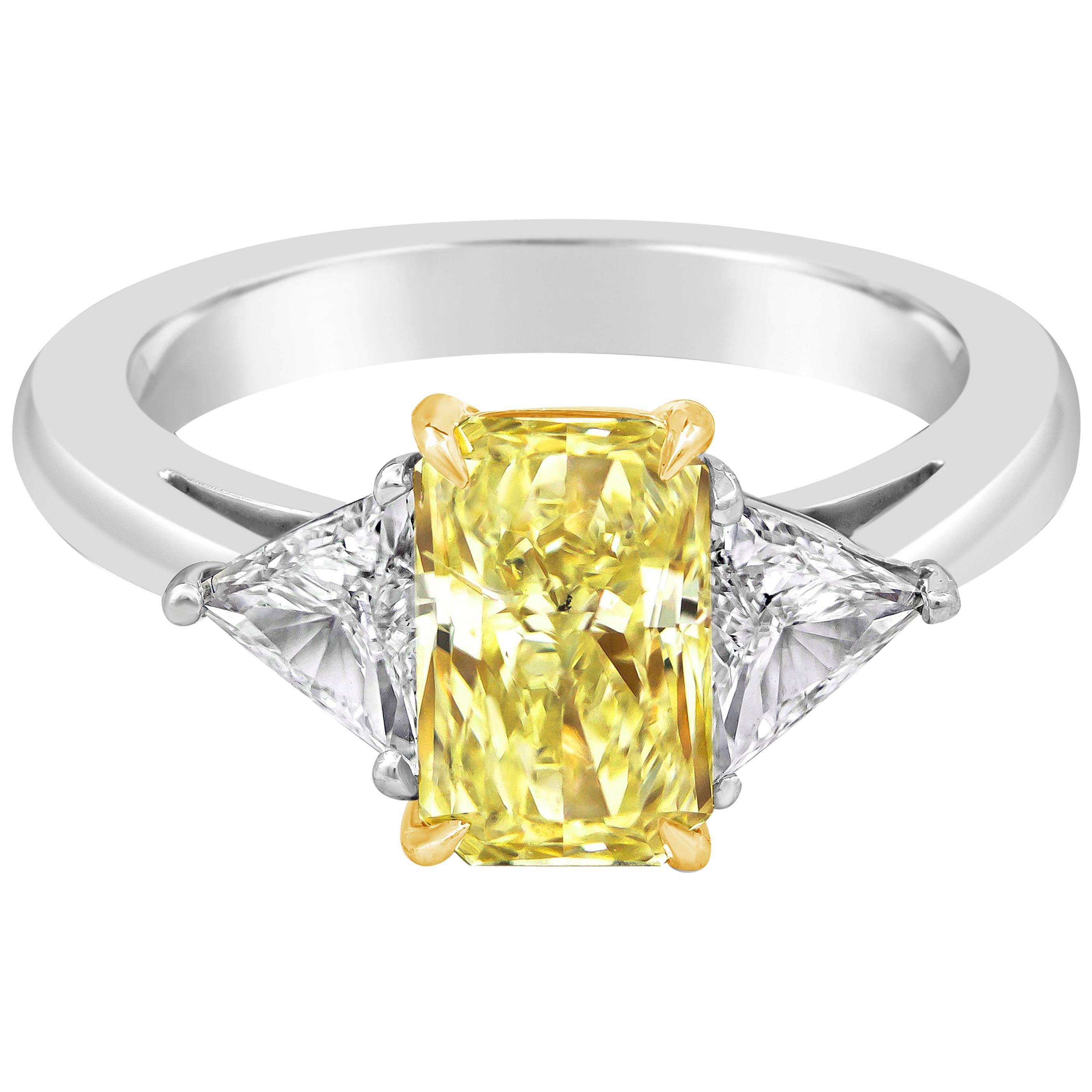 Platinum Three-Stone Fancy Yellow Radiant Cut Diamond Engagement Ring at 1stDibs