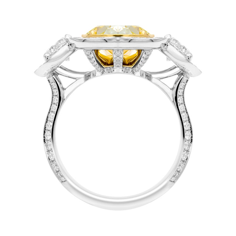 GIA Certified Oval Fancy Light Yellow 6.03 Carat 3-Stone Arabic Style Ring For Sale at 1stDibs