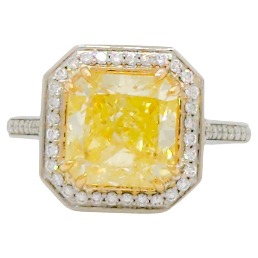 14.10 Carat Fancy Light Yellow Emerald Cut Diamond And White Diamond Ring In 18K at 1stDibs ...