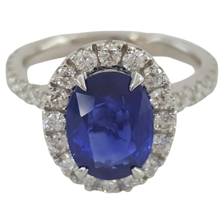 GIA Certified 2.40 Carat Vivid Blue Oval Sapphire and Diamond Halo Ring ...