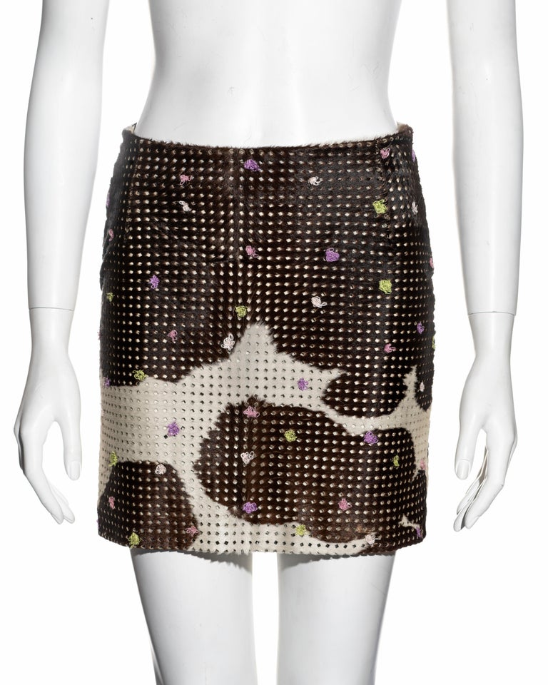 Gianni Versace perforated cowhide mini skirt with floral embroidery, ss ...