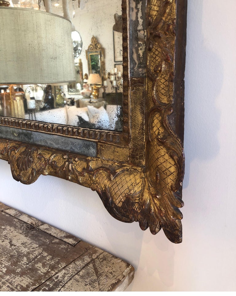 Gilded Antique Rococo Mirror with Detachable Figure at 1stDibs
