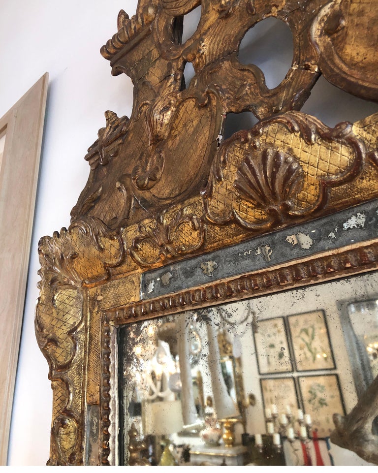 Gilded Antique Rococo Mirror with Detachable Figure at 1stDibs