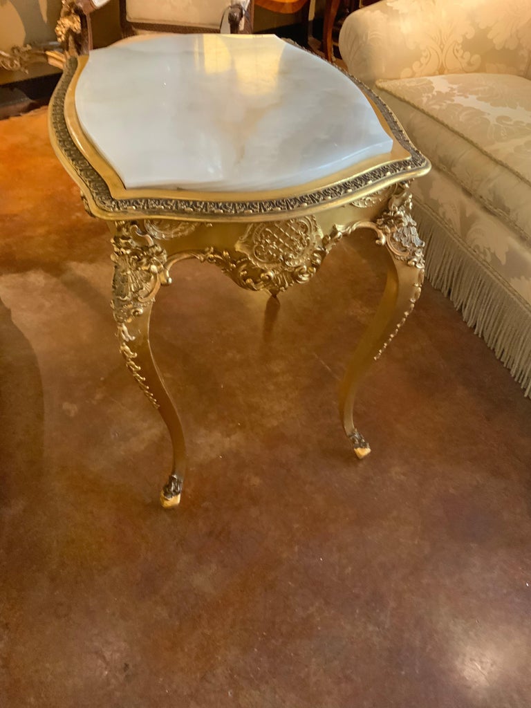 Giltwood center table in the Louis XV-Style, turtle form with onyx top ...