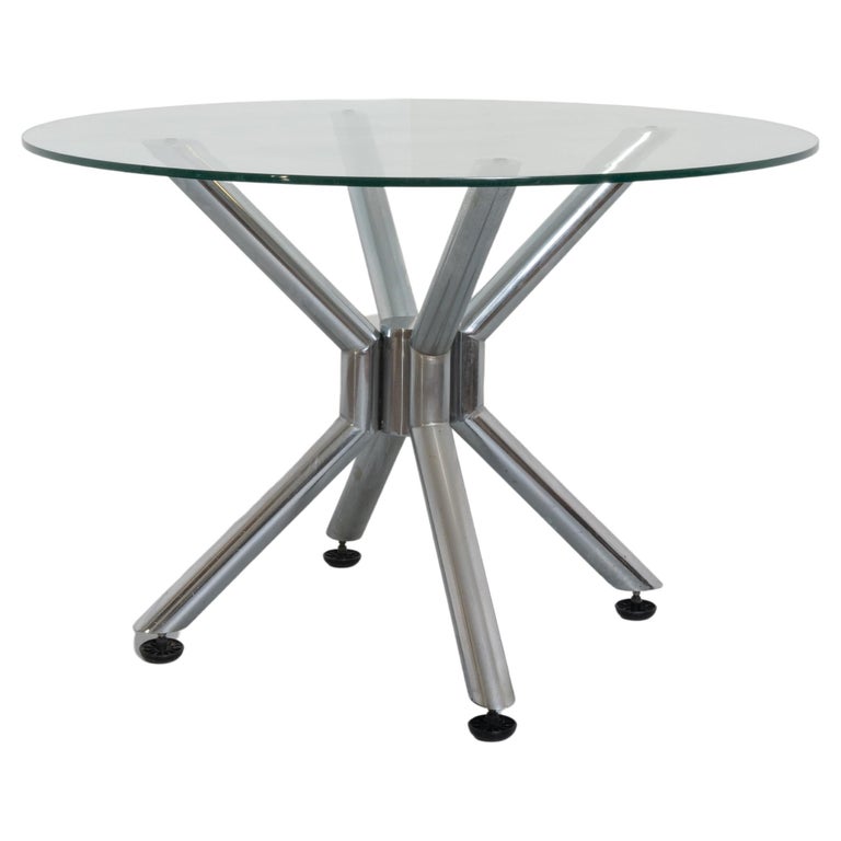 Giotto Stoppino, Round table in beveled crystal with tubular steel ...