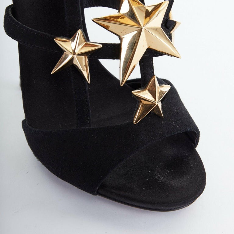 GIUSEPPE ZANOTTI Alien black suede leather gold star strappy sandals ...
