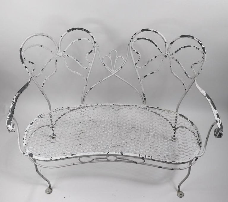 Glamorous Wrought Iron Garden Bench with Bow Tie Back at 1stDibs