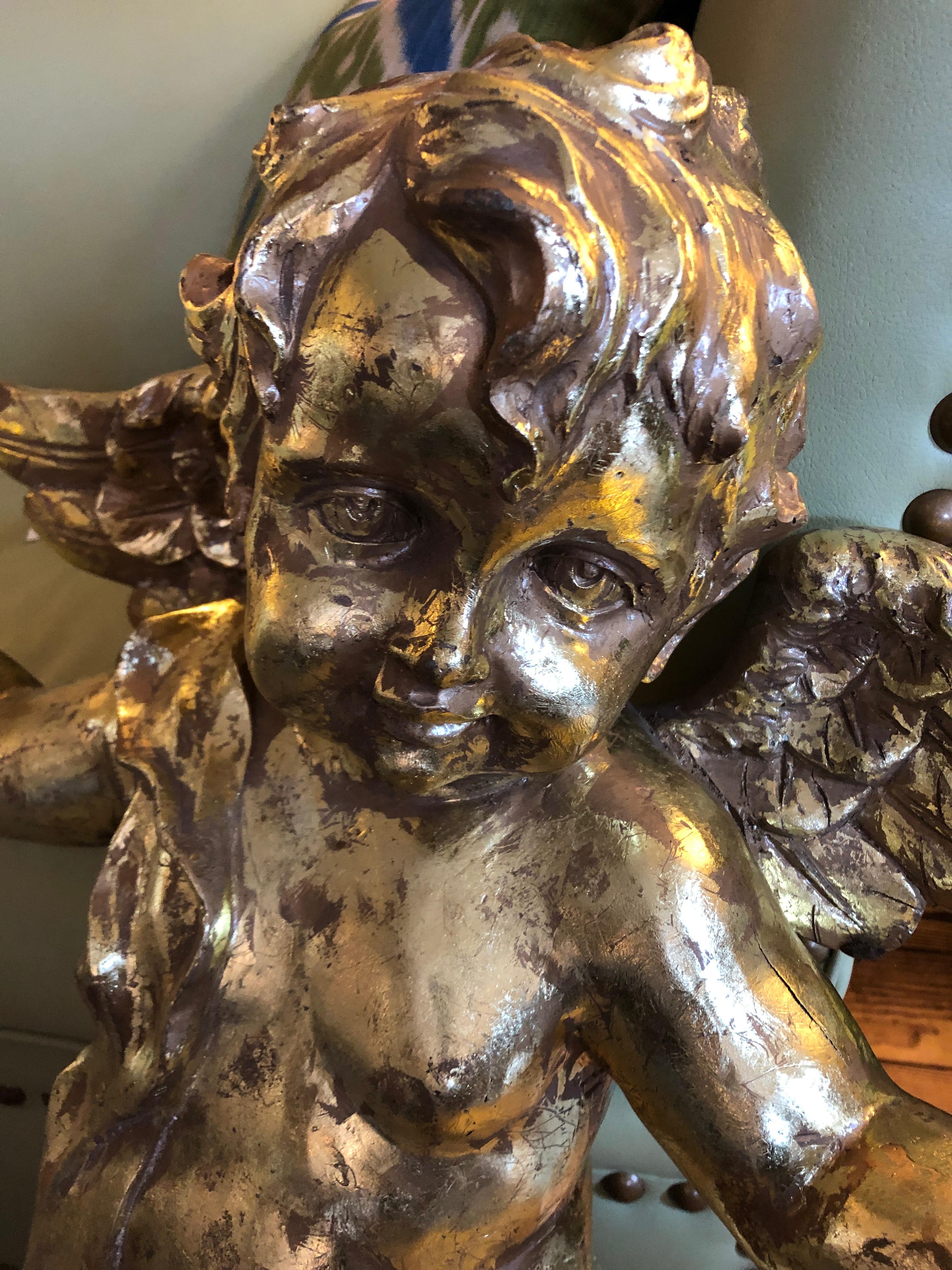 Glistening Pair of Decorative Gilded Rococo Cherub Sculptures at 1stDibs