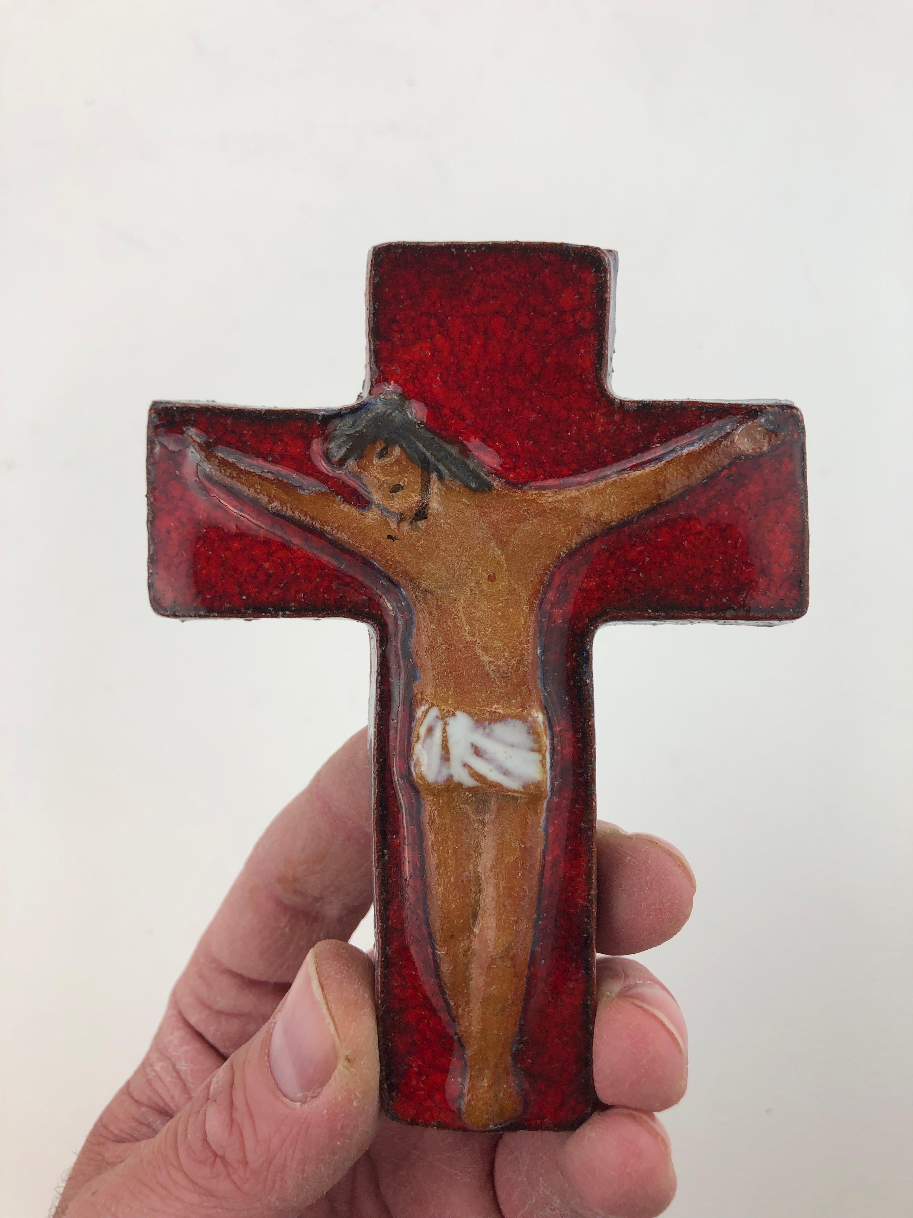 Glossy Red Ceramic Cross with Abstract Matte Christ Figure in Earth ...