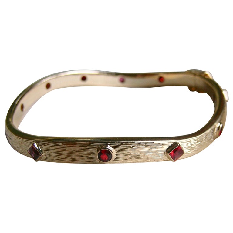 Gold and Ruby Wave Bangle For Sale at 1stDibs