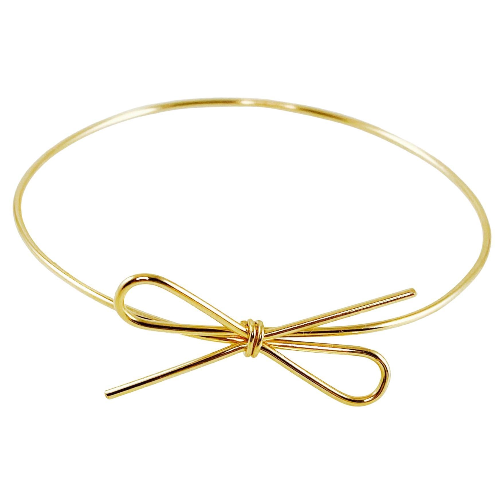 Gold Bow Bangle by Gwen Beloti For Sale at 1stDibs