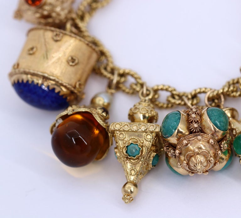 Gold Charm Bracelet with Eleven Charms with Assorted Stones at 1stDibs