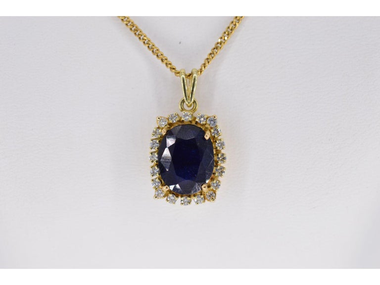 Gold Entourage Pendant with Sapphire and Diamonds For Sale at 1stDibs