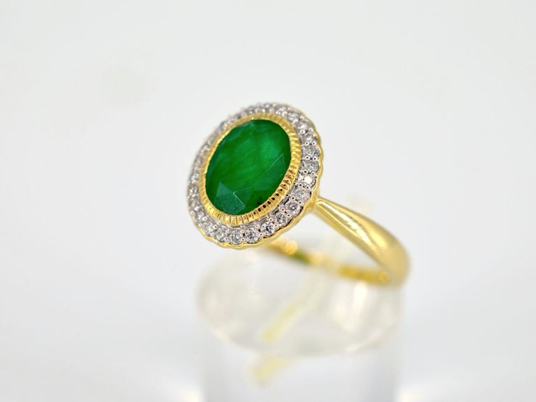 Gold Entourage Ring with Diamonds and Emerald For Sale at 1stDibs