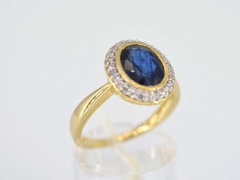 Gold Entourage Ring with Diamonds and Sapphire For Sale at 1stDibs
