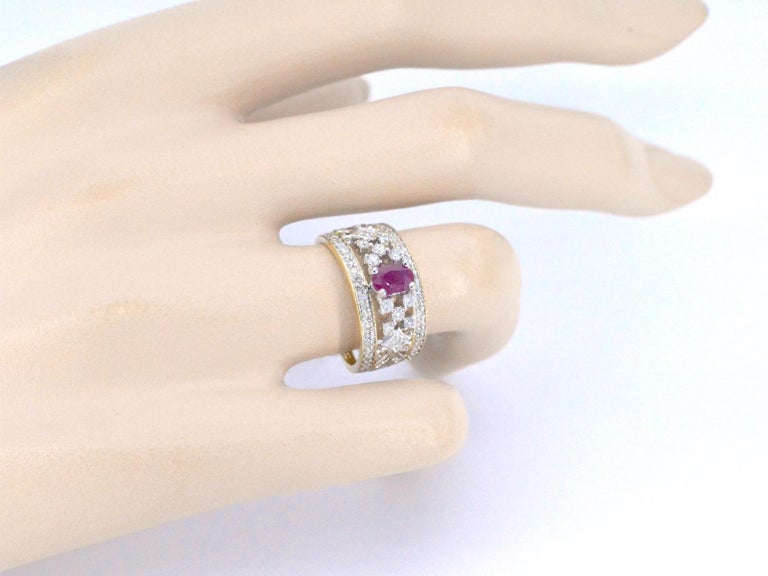 Gold Exclusive Ring Full of Diamonds and a Ruby For Sale at 1stDibs