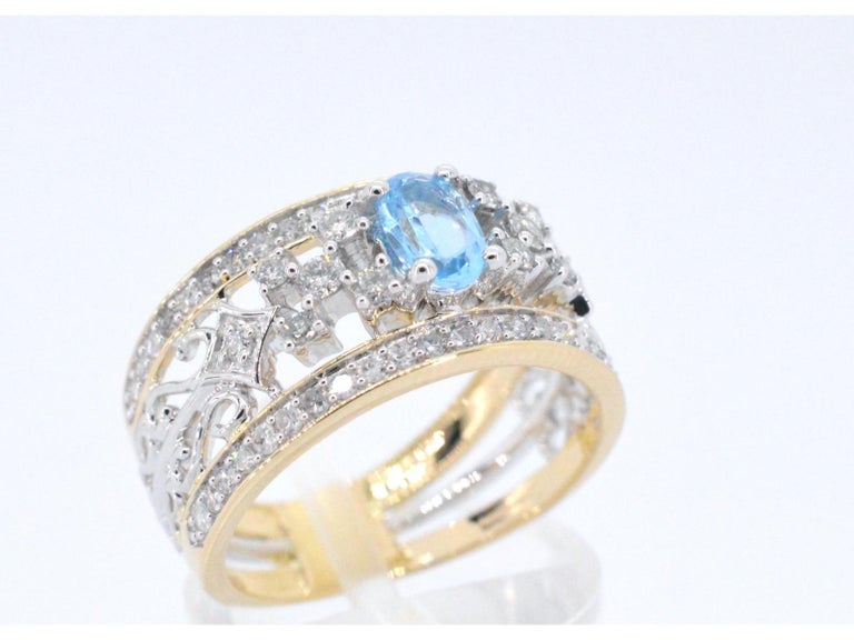 Gold Exclusive Ring Full of Diamonds and a Topaz For Sale at 1stDibs
