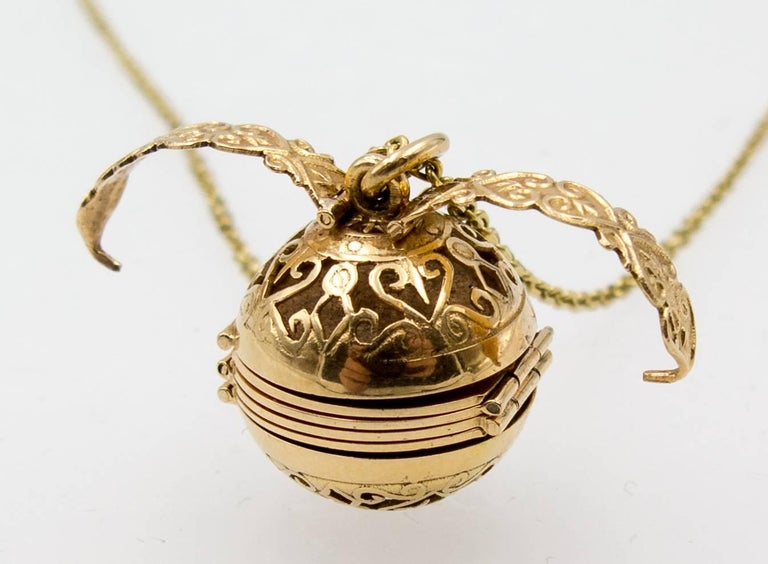 Gold Multiframe Ball Locket and Chain at 1stDibs