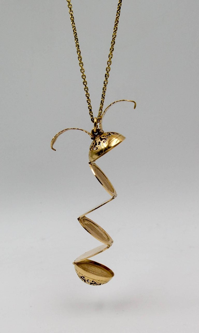 Gold Multiframe Ball Locket and Chain at 1stDibs