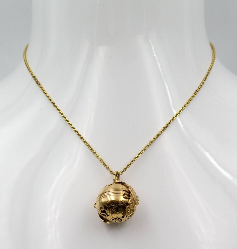 Gold Multiframe Ball Locket and Chain at 1stDibs