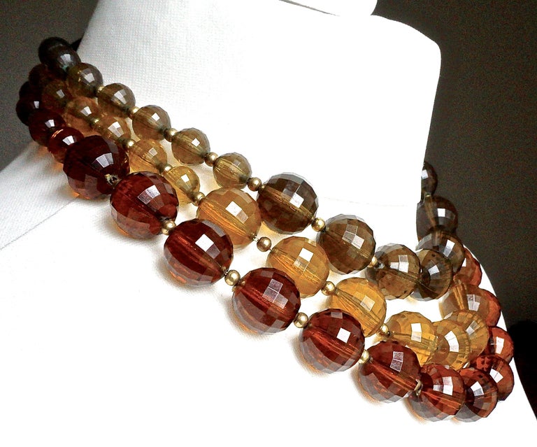 Gold Plated Triple Strand Multi Colored Plastic Bead Necklace with a ...