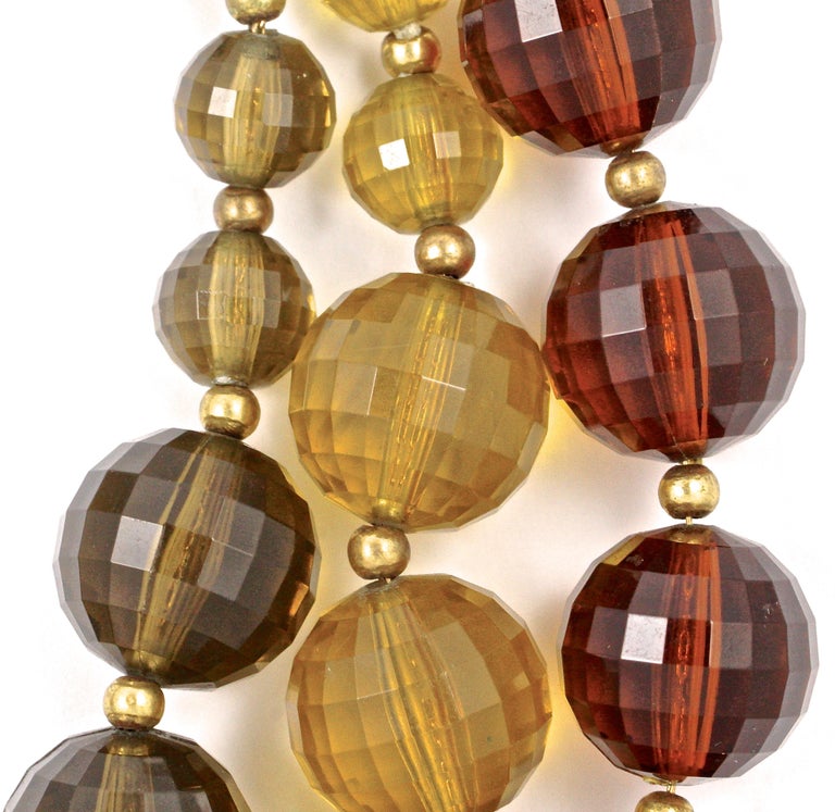 Gold Plated Triple Strand Multi Colored Plastic Bead Necklace with a ...