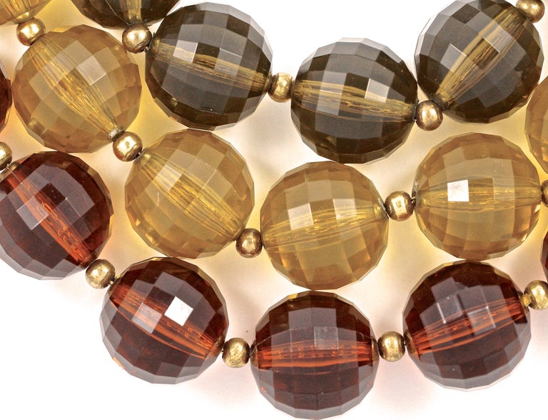 Gold Plated Triple Strand Multi Colored Plastic Bead Necklace with a ...