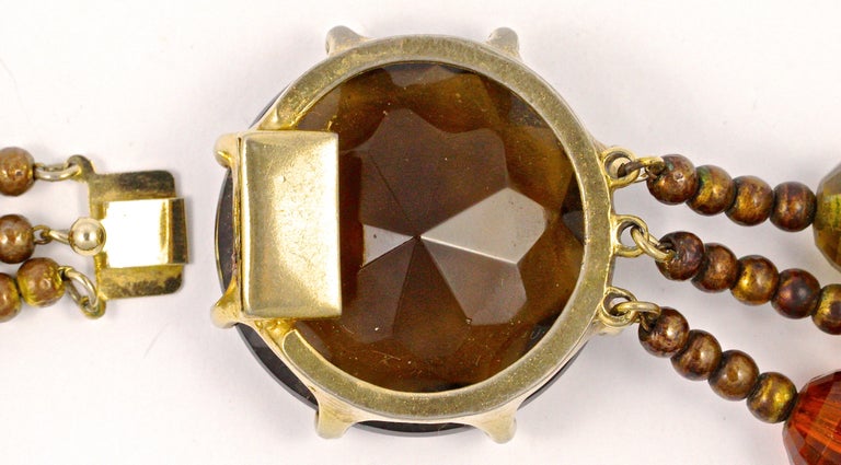 Gold Plated Triple Strand Multi Colored Plastic Bead Necklace with a ...