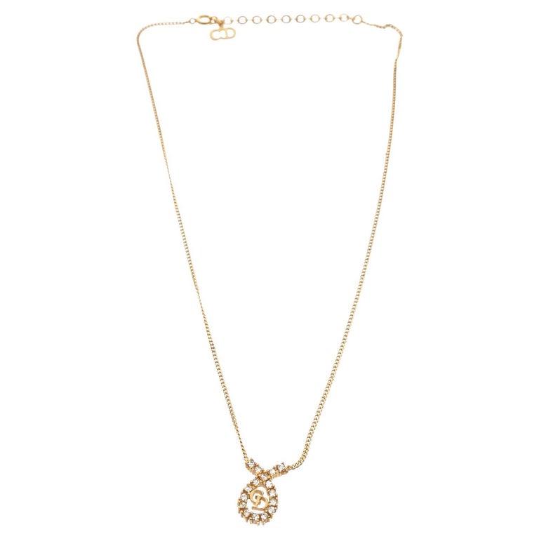 Gold-tone long chain Christian Dior necklace features DIOR logo pendant ...
