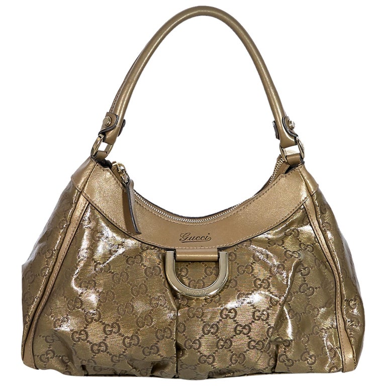 Gucci Gold Coated Monogram Shoulder Bag at 1stDibs